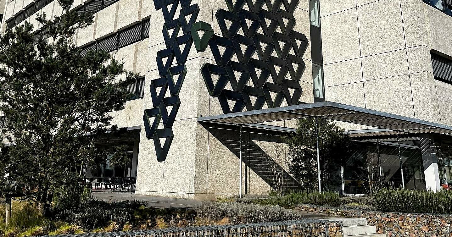 Creative ivy-shaped solar panel system against façade High Tech Campus ...